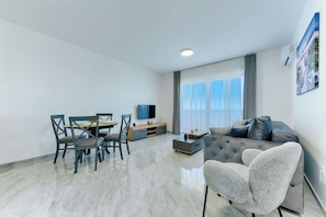 Apartamento Premium, 1 quarto, varanda, vista para o mar | Cofre no quarto, cortinas/cortinados opacos, quartos insonorizados 