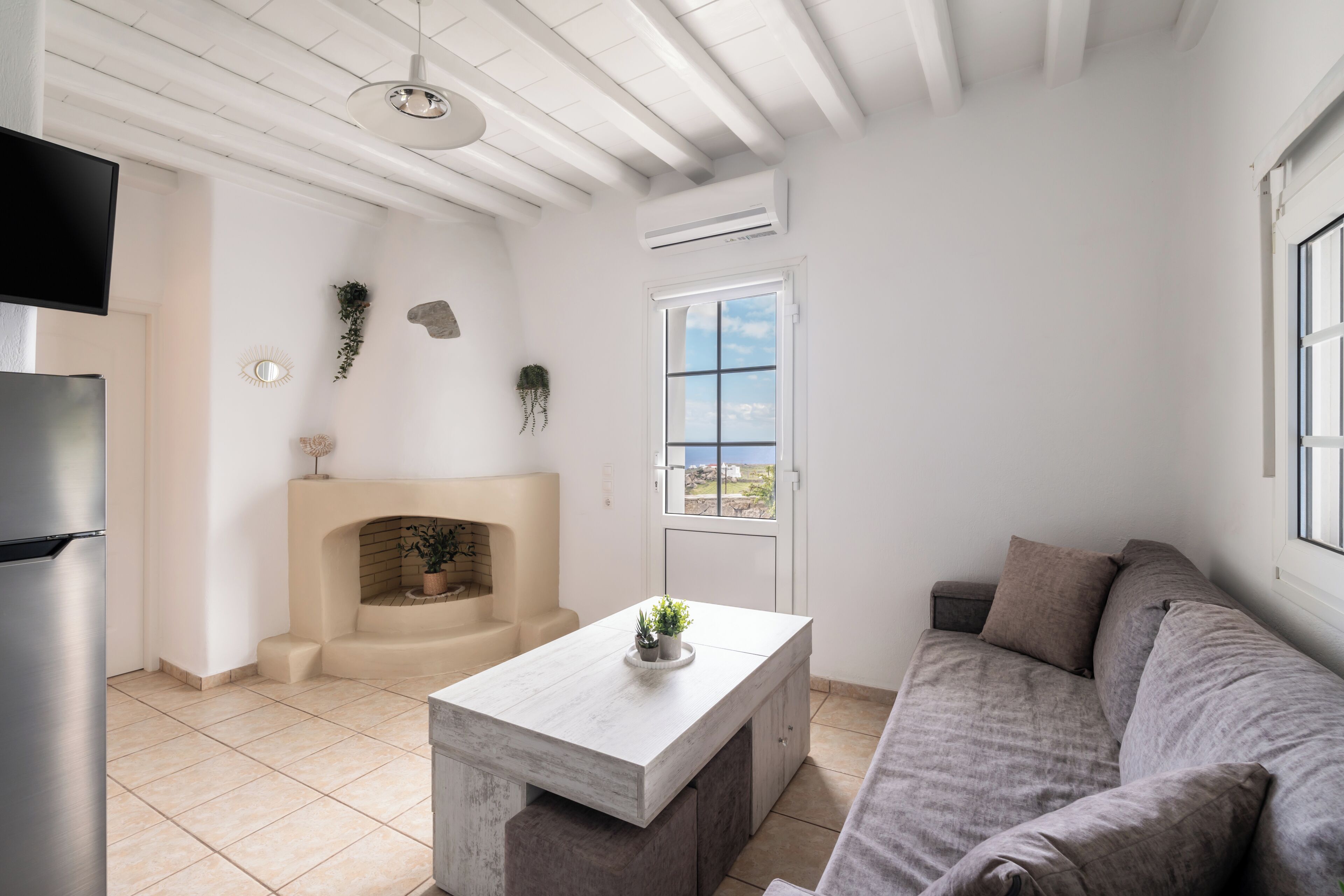 Quarto duplo, vista para o mar | Área de estar