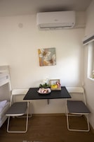 Apartamento família, várias camas, aceita animais de estimação, vista para o pátio | Parte interna