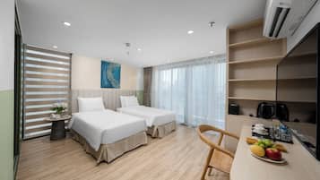 Suite-Estúdio, Vista para a cidade | Roupa hipoalergénica, cofre no quarto, secretária