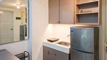 Apartamento Standard | Cozinha privada | Uma chaleira elétrica