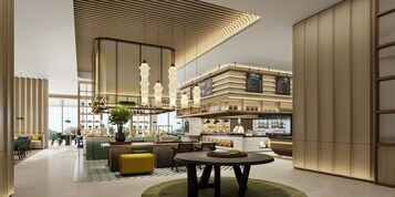 Um hall de hotel moderno com uma ilha central, áreas de estar e teto alto com design padronizado.