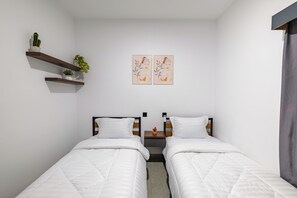 Quarto Twin Deluxe, 1 quarto, não fumadores | Roupa de cama fornecida 
