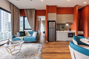 Suíte premier, 2 quartos, sacada | Área de estar