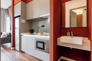 Suíte premier, 2 quartos, sacada | Cozinha privada