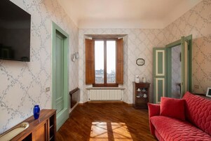 Suite Deluxe, vista para a montanha | Sala de estar