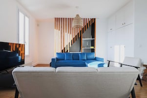 Apartamento | Sala de estar | Lareira 