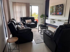 Apartamento, 2 quartos, piscina particular | Sala de estar