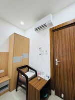 Quarto luxo, vista para a cidade | Parte interna