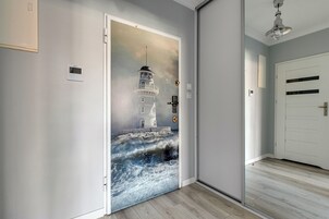 Apartamento família, vista para a cidade | Parte interna