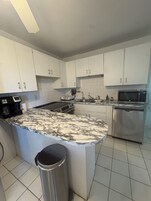 Apartamento Familiar, vista para o oceano | Cozinha privada