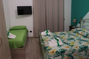 Quarto quádruplo, vista para a cidade