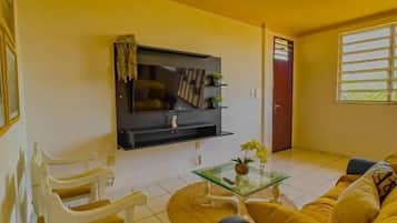 Apartamento, varanda, Vista para a cidade | Sala de estar