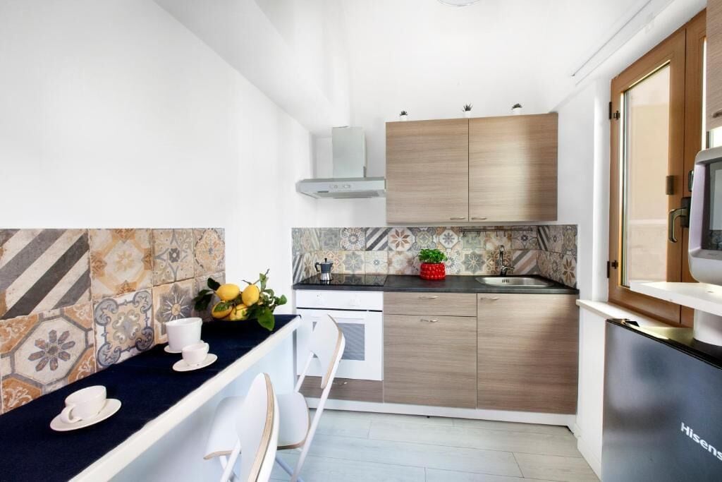 Apartamento Cidade, 2 quartos | Cozinha privada | Uma máquina de café expresso, uma cafeteira/bule, uma chaleira elétrica 