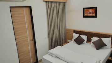 Quarto casal standard, vista para a cidade