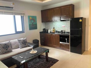 Apartamento, 1 quarto | Sala de estar