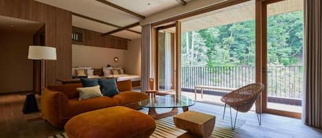 Quarto duplo básico, varanda coberta, vista para o pátio | Área de estar