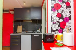 Estúdio (A1) | Cozinha privada | Geladeira, cooktop, chaleira elétrica, torradeira