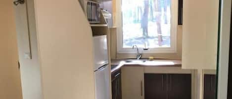 Bangalô superior | Cozinha privada | Máquina de café expresso