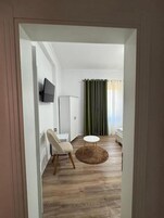 Quarto Duplo Deluxe, vista para o pátio | Wi-fi grátis