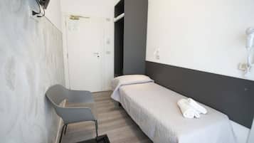 Quarto solteiro, sacada