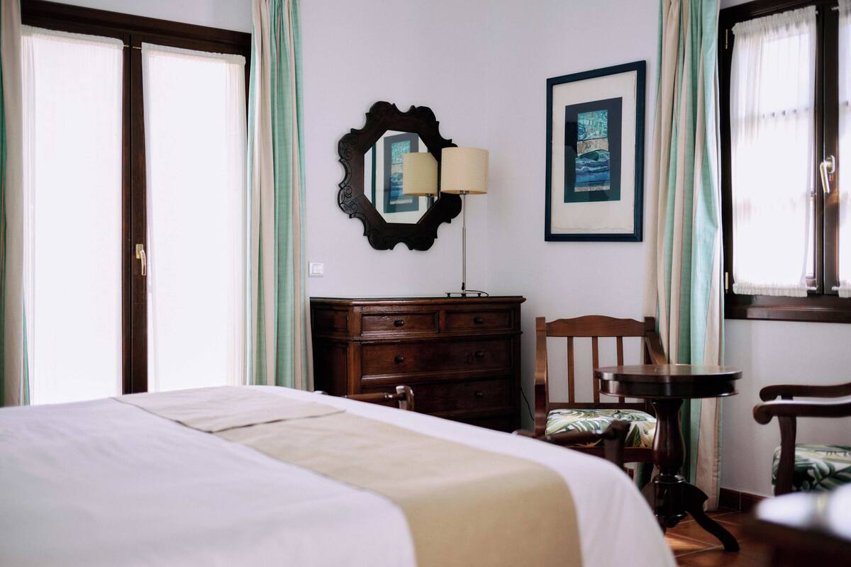 Quarto casal panorâmico, 1 cama Queen, vista para a montanha | Terraço/pátio