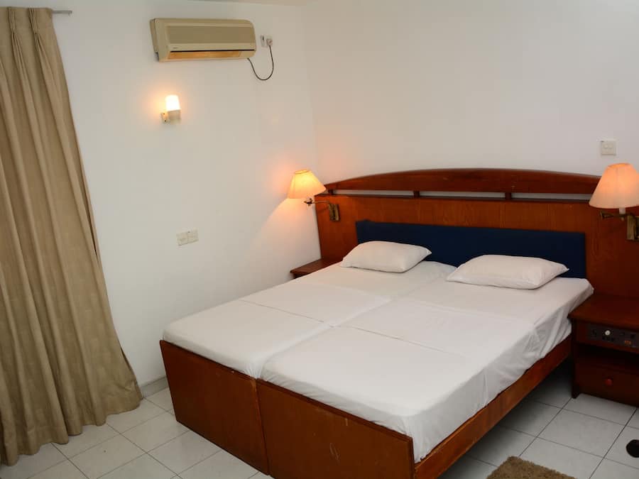 Quarto Standard (with AC) | Secretária, camas desdobráveis, Wi-fi grátis