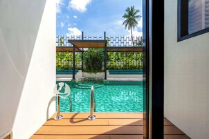 Quarto Twin Deluxe, acesso à piscina | Vista do quarto
