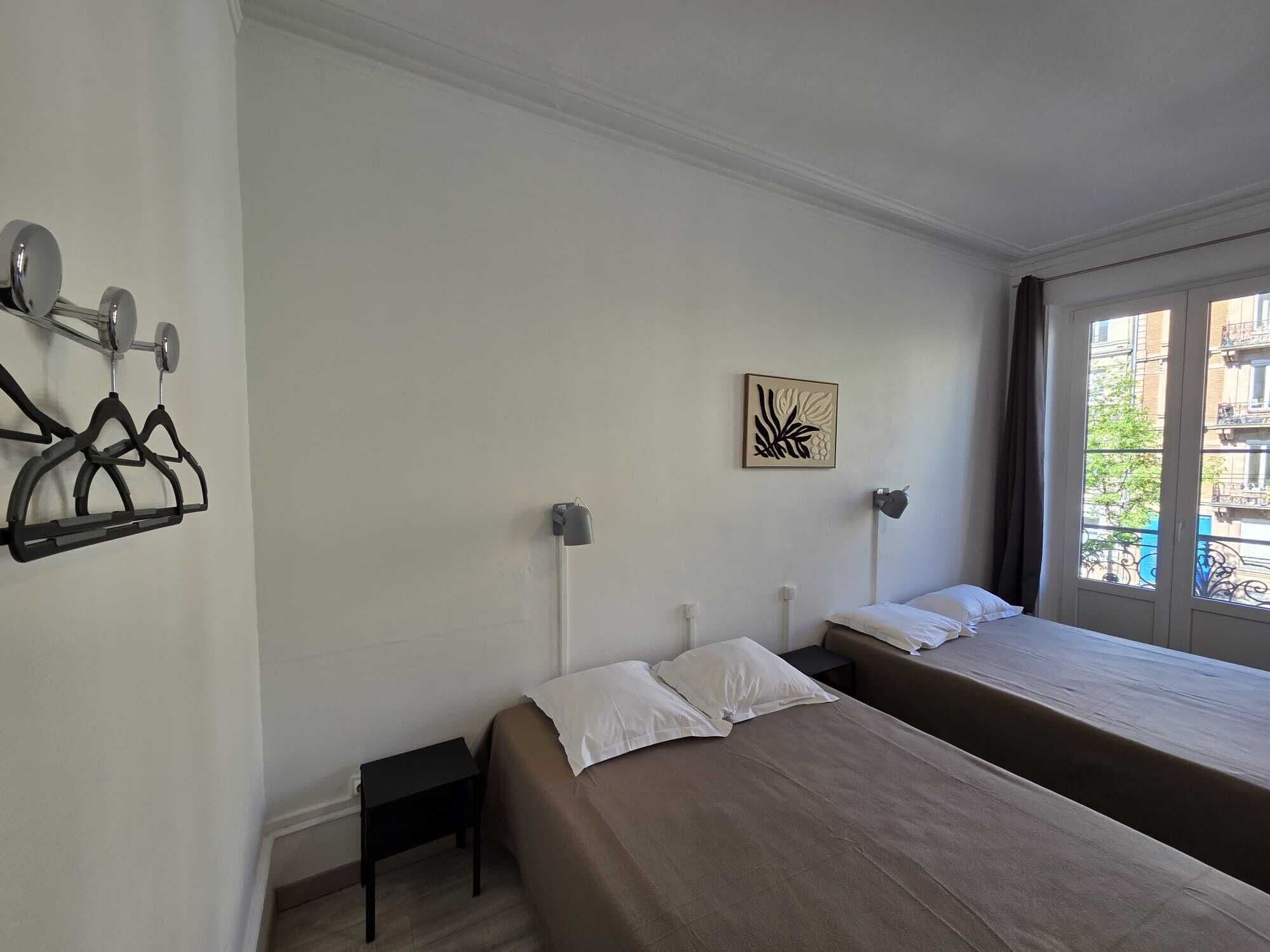 Quarto quádruplo, banheiro privativo | Wi-Fi de cortesia, roupa de cama