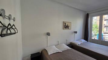 Quarto quádruplo, banheiro privativo | Wi-Fi de cortesia, roupa de cama