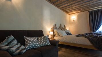 Quarto luxo, 1 quarto, terraço, vista para a montanha | Roupas de cama premium, edredons de pluma, frigobar, cofres nos quartos