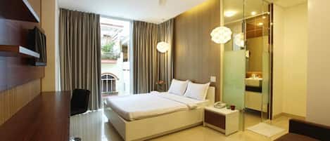 Quarto Duplo Deluxe | 1 quarto, minibar, secretária, Wi-fi grátis