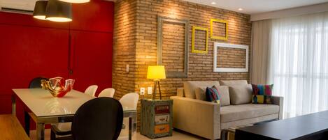 Apartamento premier, 3 quartos | Sala de estar | TV LCD