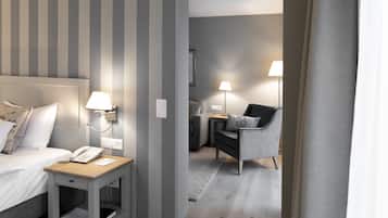 Quarto Familiar, pátio, no canto | Minibar, cofre no quarto, secretária, Wi-fi grátis
