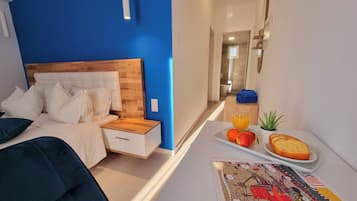 Quarto Duplo Superior | Minibar, cofre no quarto, cortinas/cortinados opacos