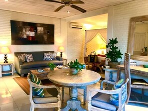 Quarto Duplo Executivo, 1 quarto, vista para a praia, em frente à praia | Sala de estar