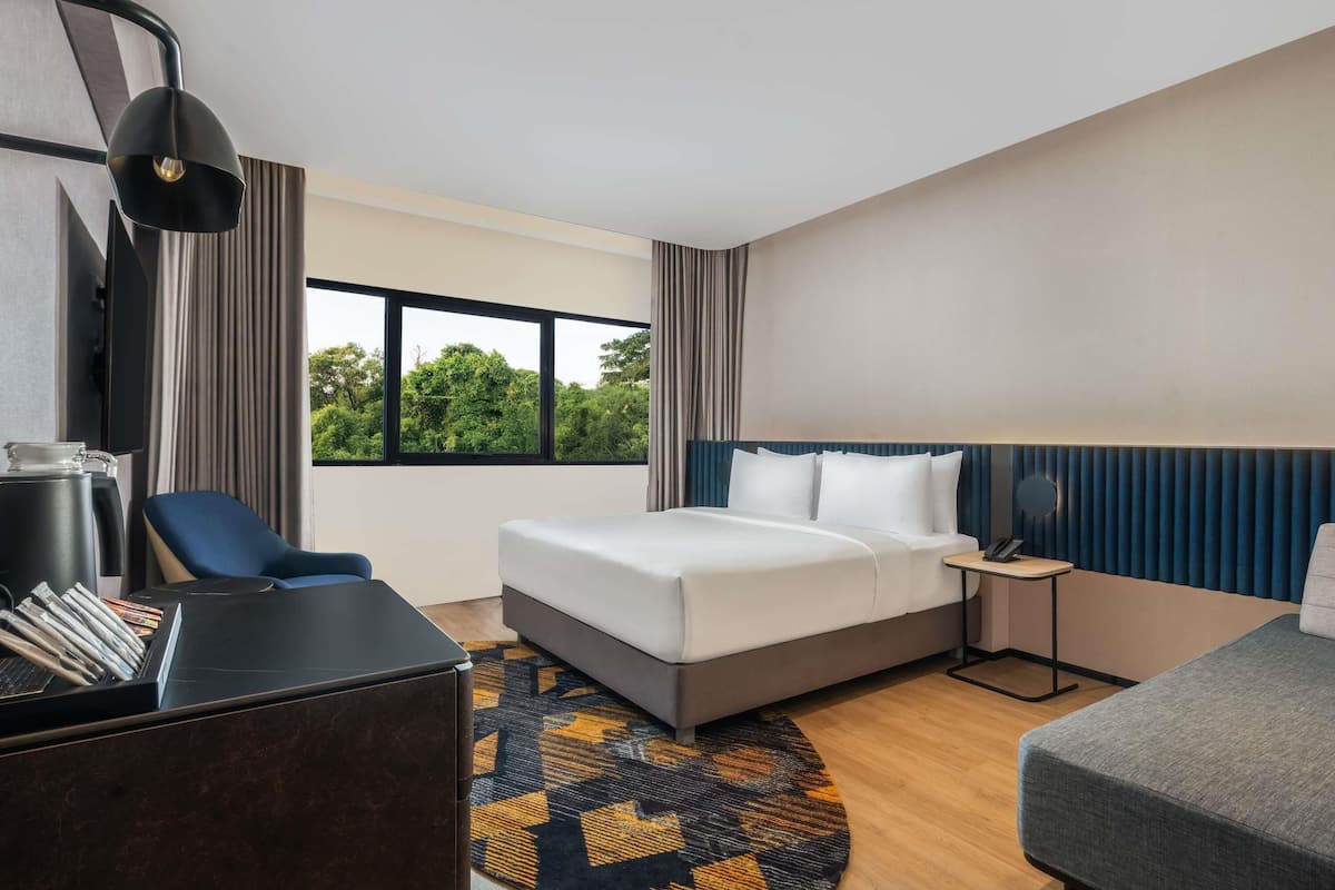 Quarto Superior, 1 cama de casal | Minibar, secretária, ferro/tábua de engomar, Wi-fi grátis