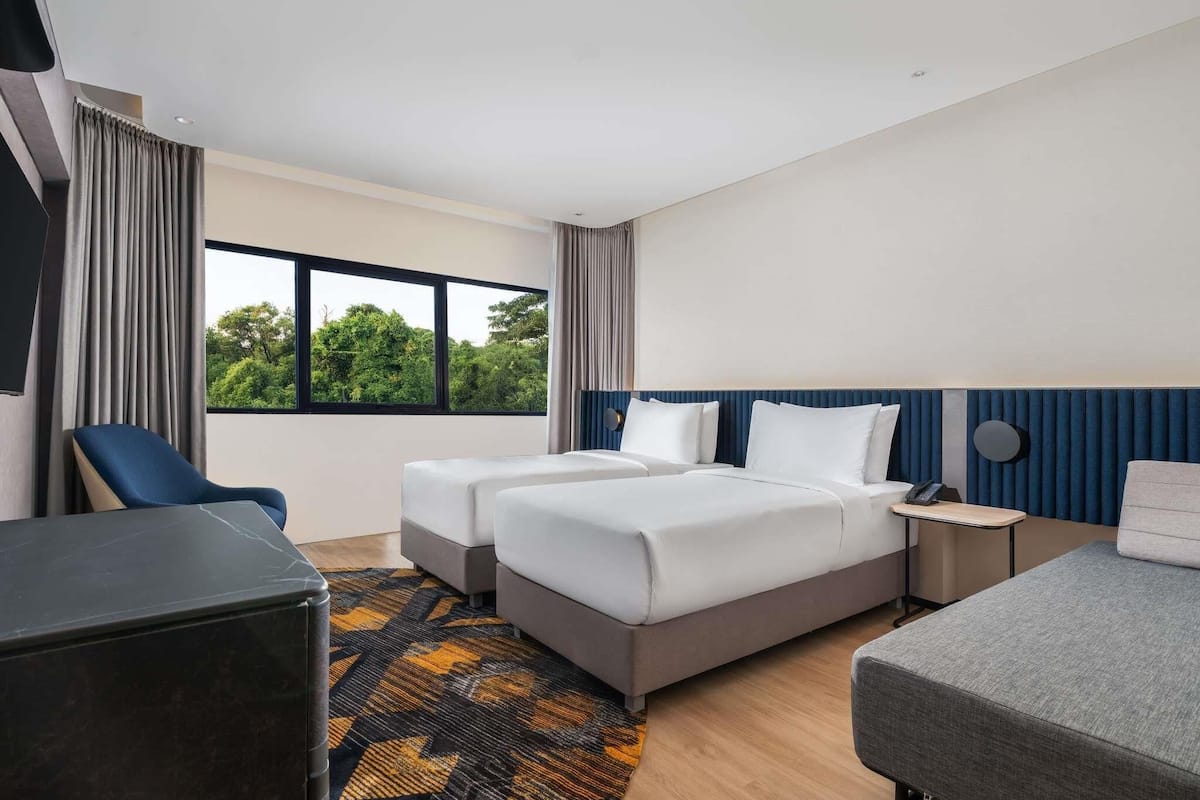 Quarto Superior, 2 camas individuais | Minibar, secretária, ferro/tábua de engomar, Wi-fi grátis