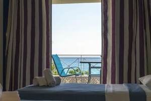 Apartamento família, 2 quartos, vista para o mar | Vista do quarto