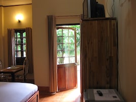 Quarto standard, vista para o jardim | Frigobar, escrivaninha, Wi-Fi de cortesia