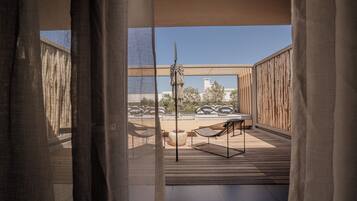Quarto Deluxe, vista para o jardim | Vista da varanda