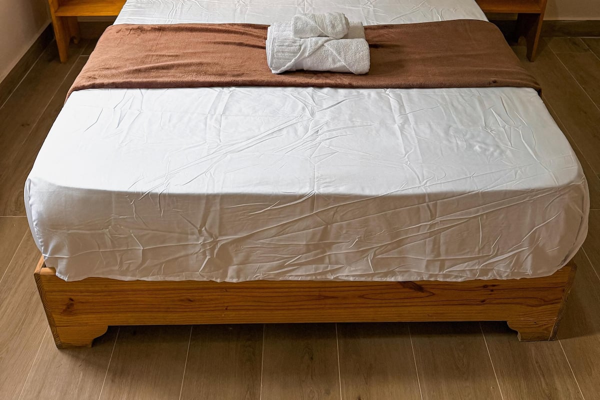 Apartamento conforto | Edredons de pluma, Wi-Fi de cortesia, roupa de cama