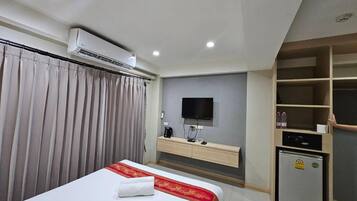Quarto casal superior | Cofres nos quartos, cortinas blackout, Wi-Fi de cortesia, roupa de cama