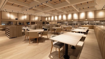 Interior moderno de restaurante com mesas altas, áreas de cabines, cozinha e bar.