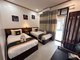 Standard Twin Room | Frigobar, cofres nos quartos, cortinas blackout, Wi-Fi de cortesia