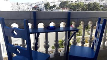 Quarto duplo, vista para a cidade | Vista da sacada