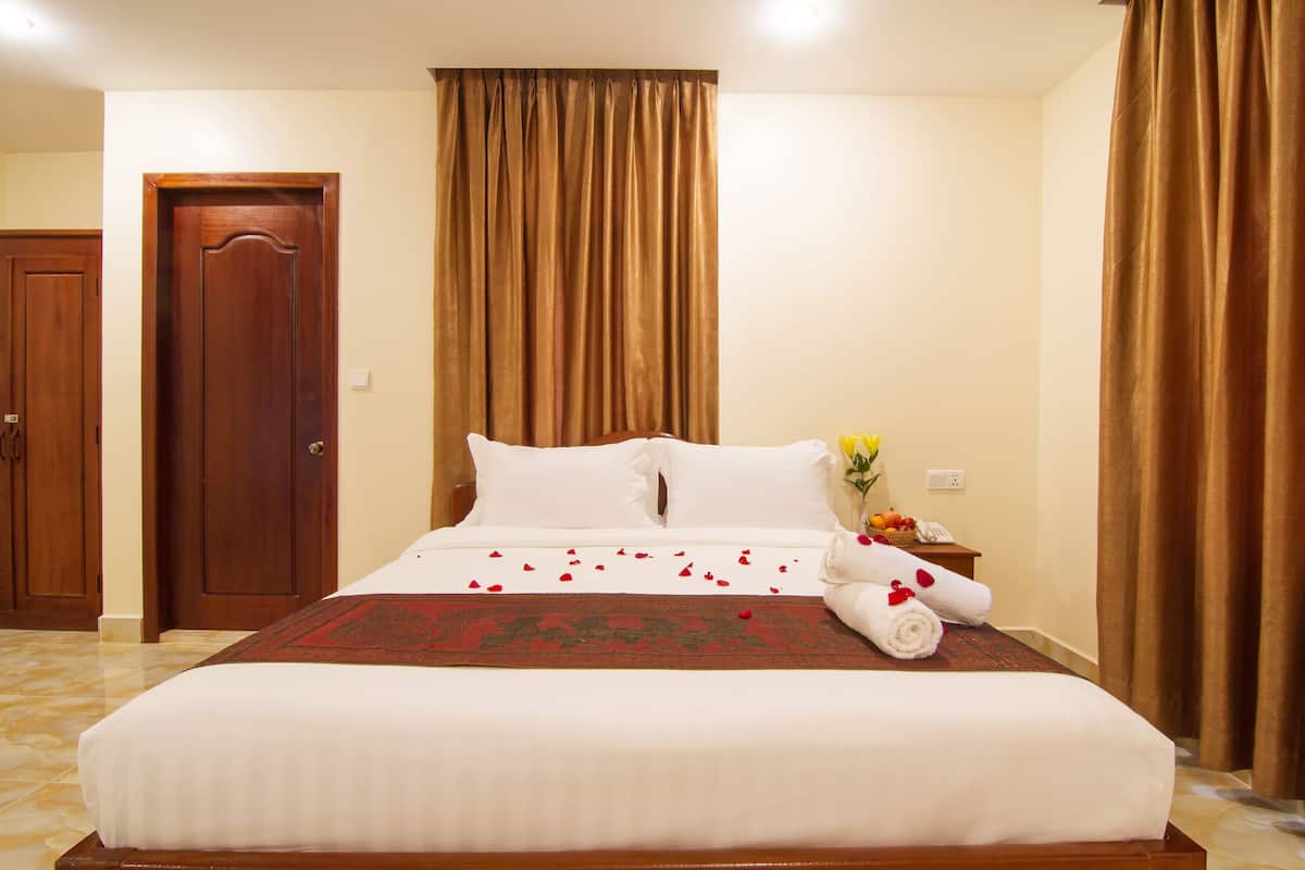 Quarto Duplo Superior | 1 quarto, minibar, cofre no quarto, secretária 