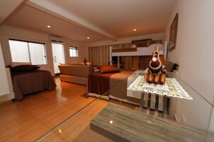 Apartamento, 2 quartos, terraço | Área de estar | TV LCD 32 polegadas com canais digitais, TV