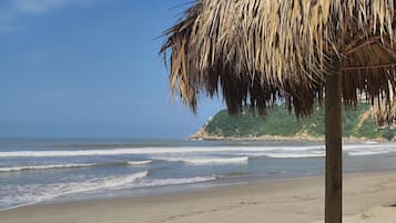 Na praia, toalhas de praia