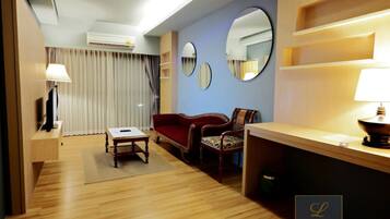 Mini Suite | Sala de estar | Smart TV 55 polegadas com canais a cabo